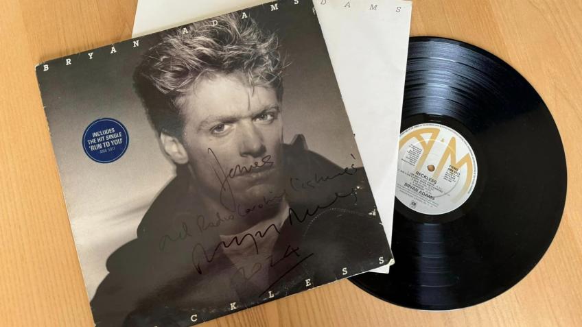 'Reckless' album signed to listeners by Bryan Adam - a Music ...